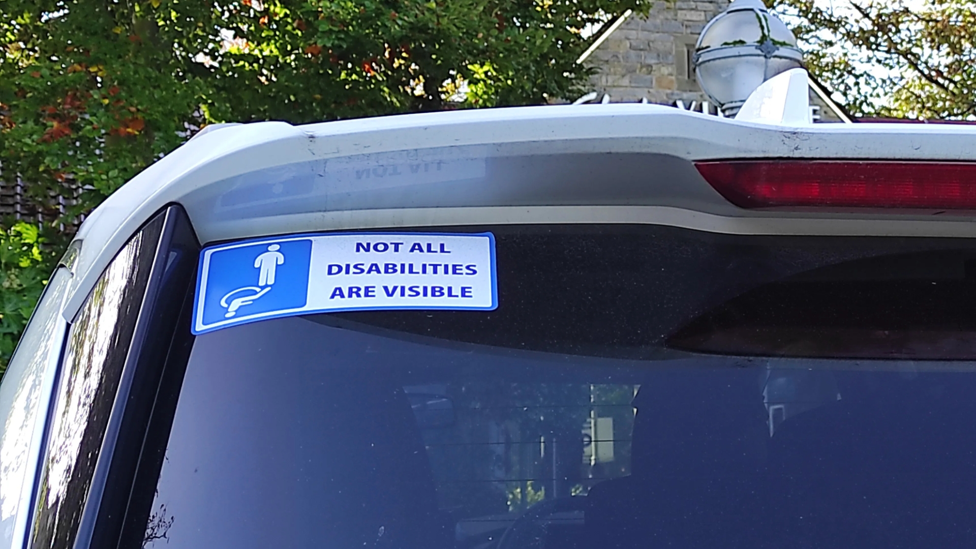An invisible disability logo for judgement-free parking